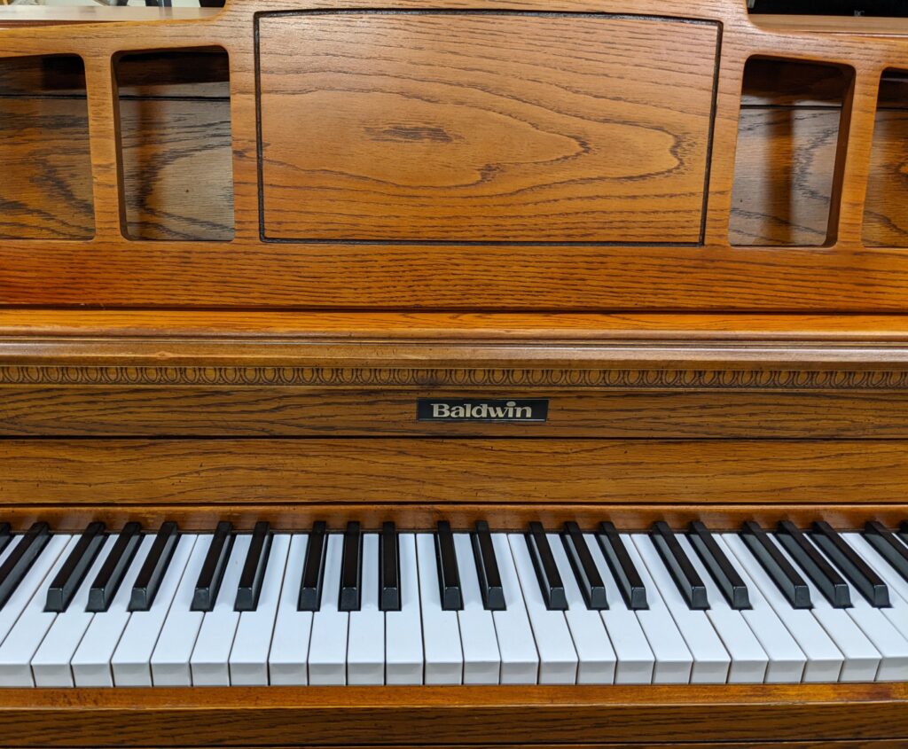 Baldwin Console in Walnut #1428033 - DC Piano Company